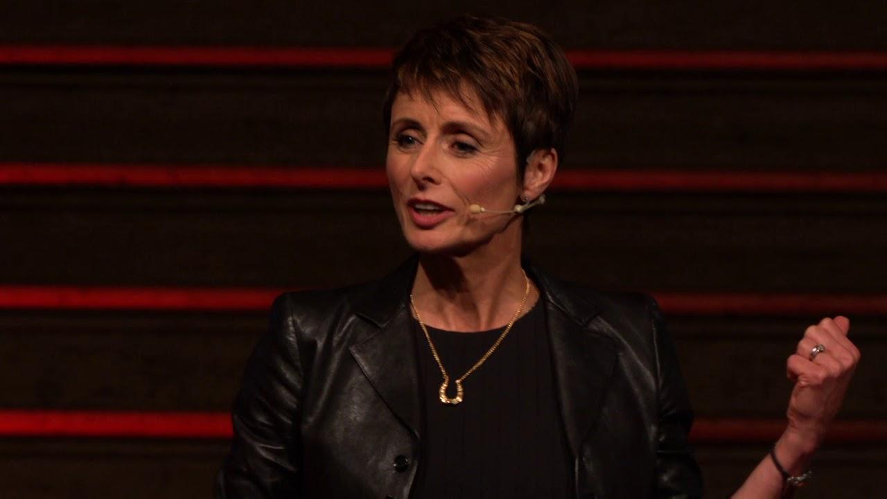 June Burgess: Smiling with all 4 cheeks - learning to let go | TED Talk