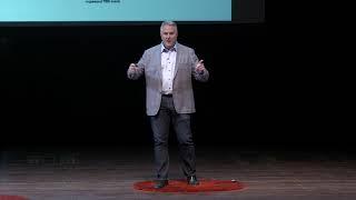 Jon Maynard: Economic Development and Tropical Fish | TED Talk