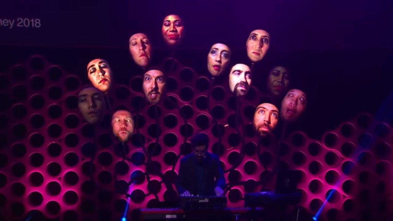The Lumiphonic Creature Choir: A giant twelve-headed creature sings ...